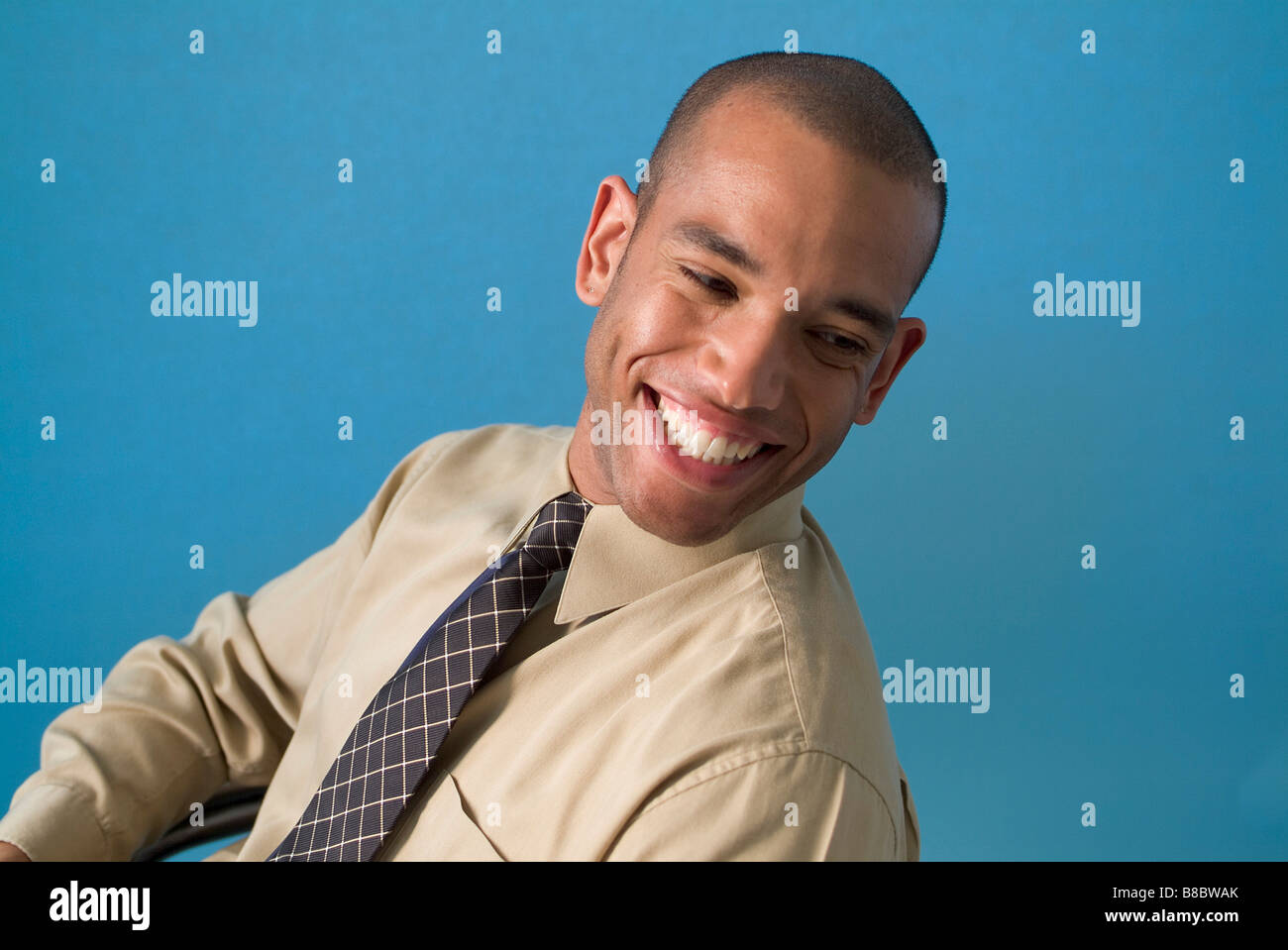 Young Businessman Laughing Stock Photo - Alamy
