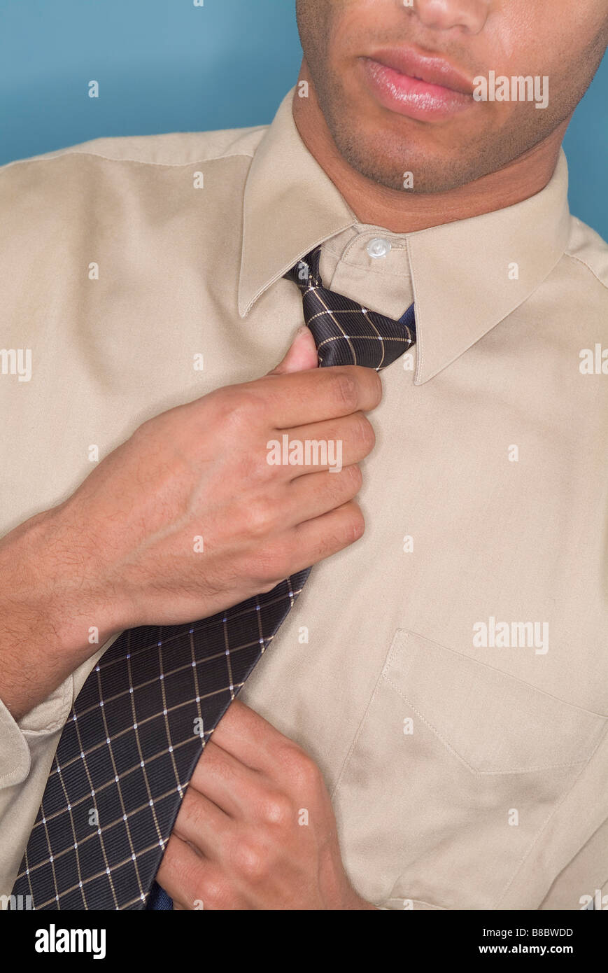 African business man fixing his tie hi-res stock photography and images ...