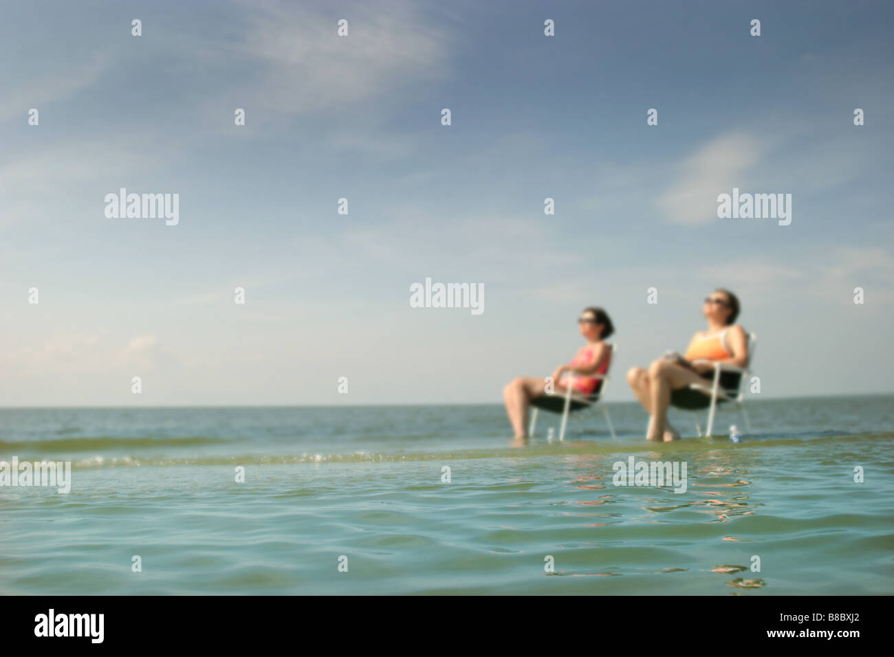 Suntanned women hi-res stock photography and images - Alamy