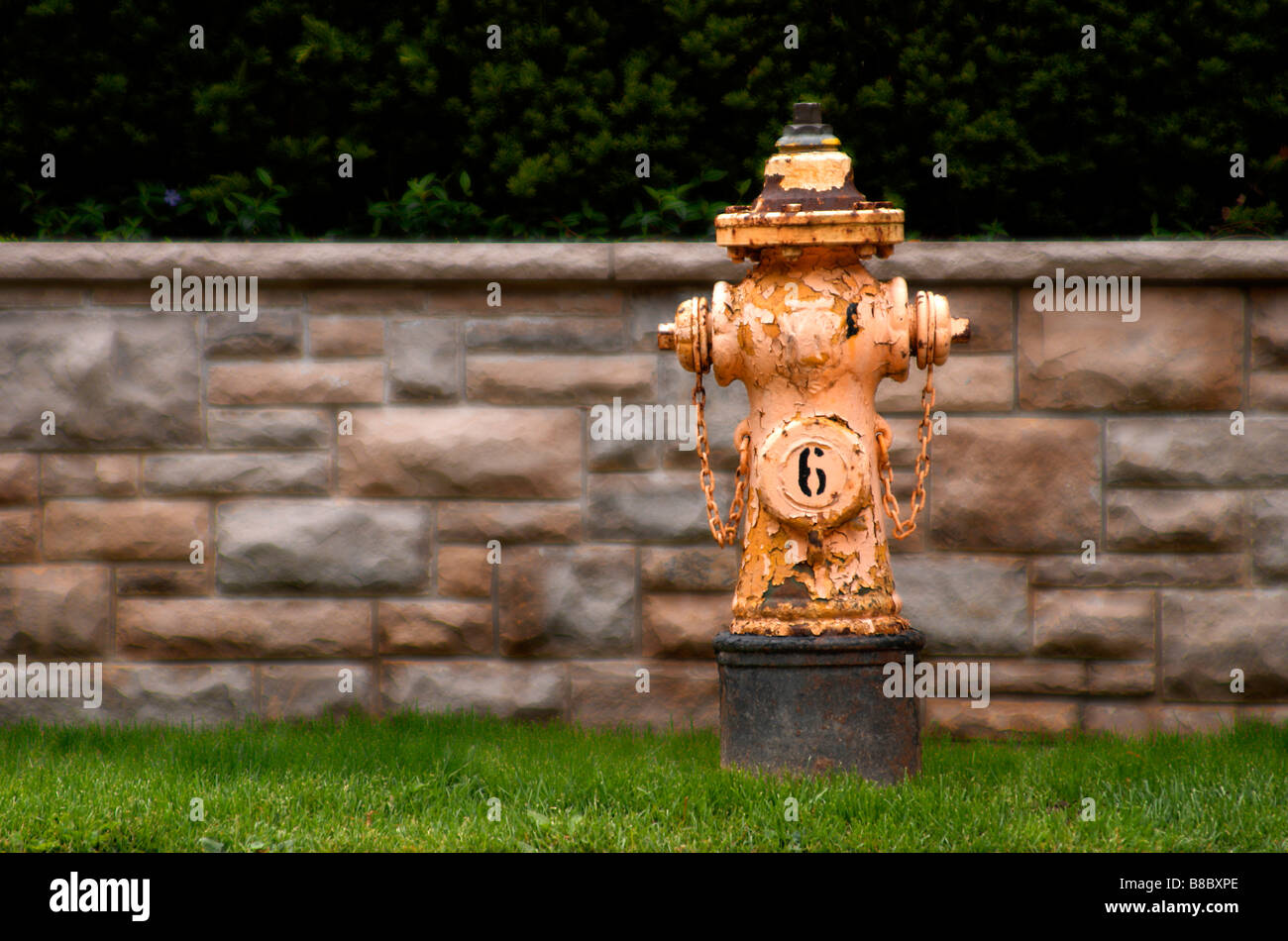 Fire Hydrant against Brick Wall Stock Photo - Alamy