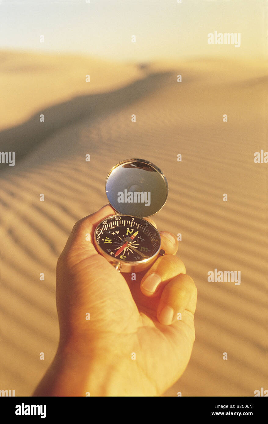 FL5136, Nation Wong; Close-up, Hand Holding Compass Desert Stock Photo ...