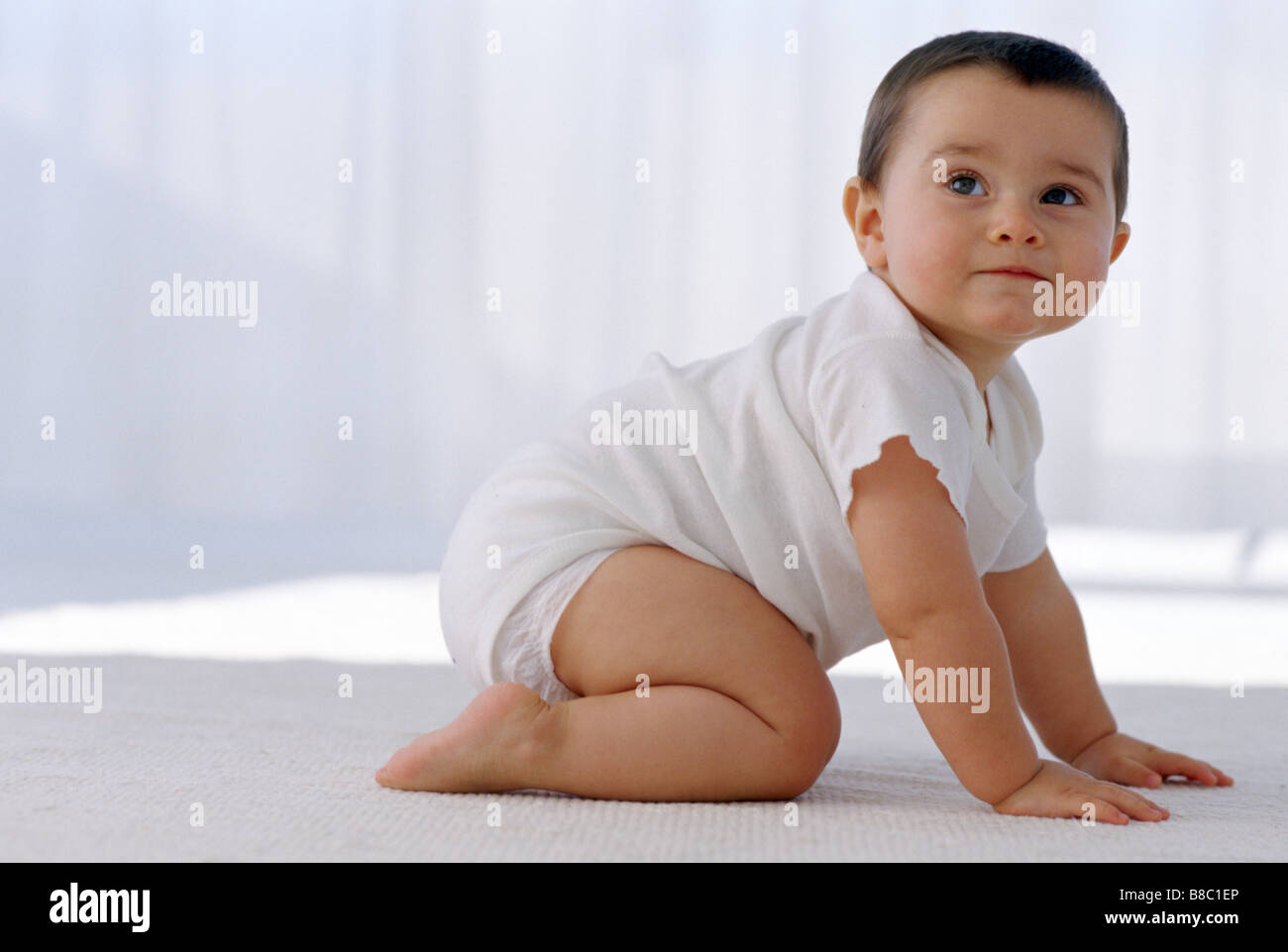 Ten Month Old Baby Crawling Stock Photo - Alamy