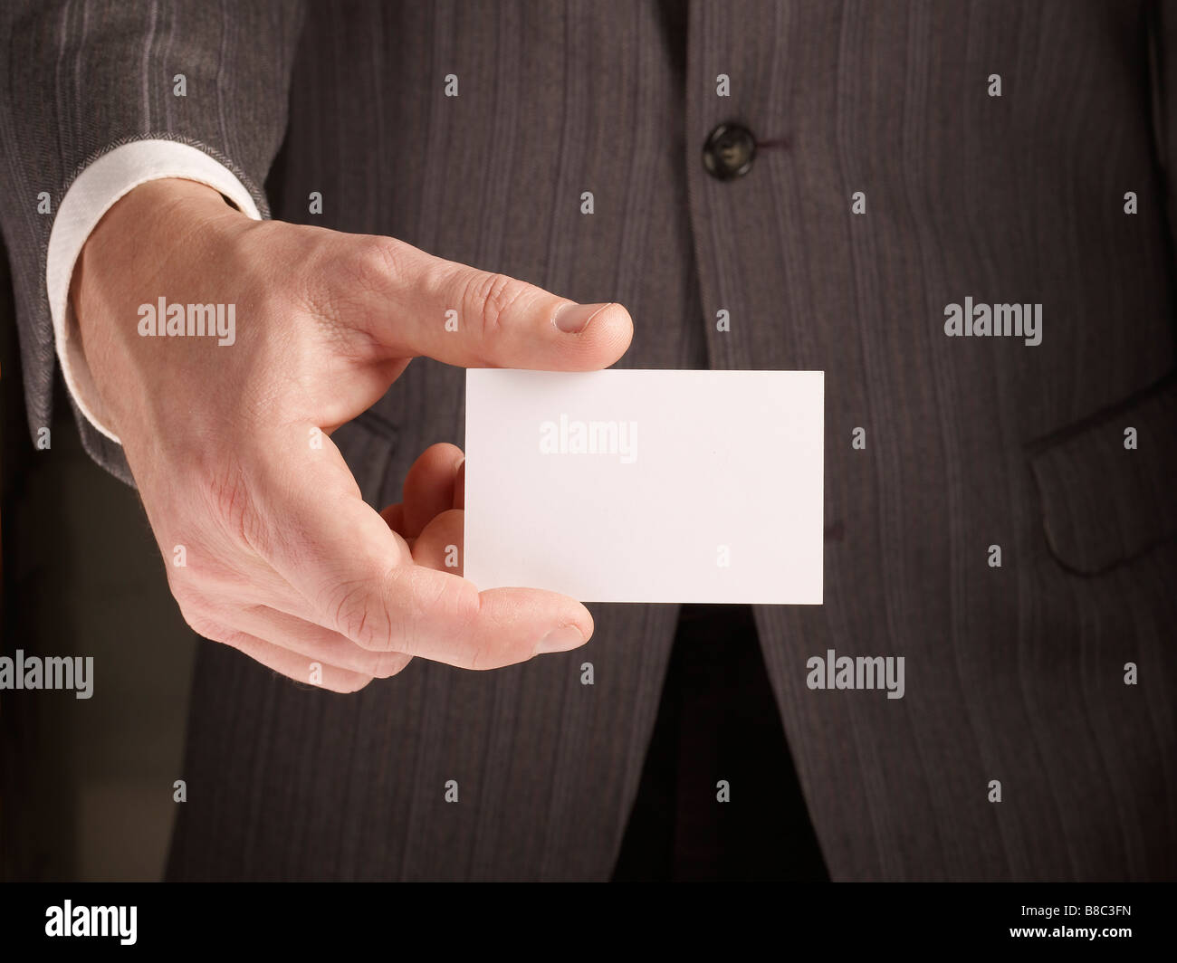 businessman showing his visiting card Stock Photo - Alamy