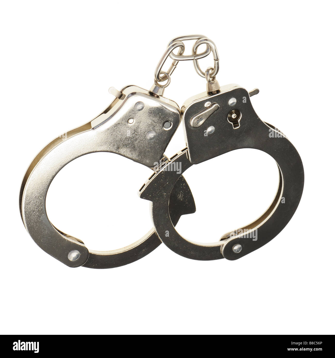 Handcuffs Iron handcuffs isolated on a white background Stock Photo - Alamy