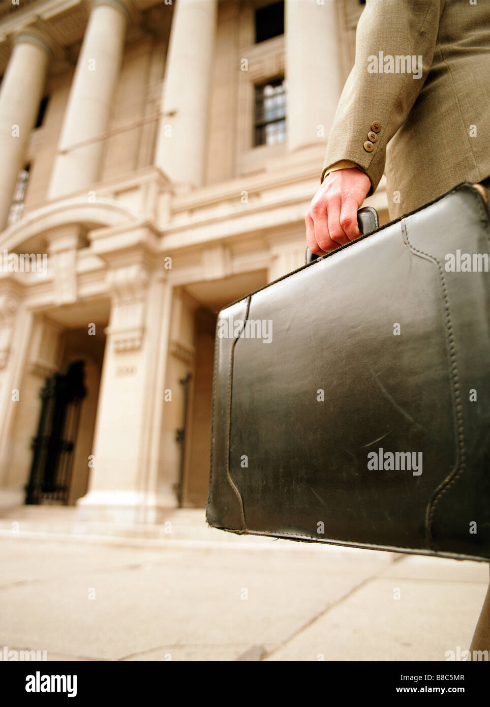Man Carrying Briefcase Stock Photo - Alamy