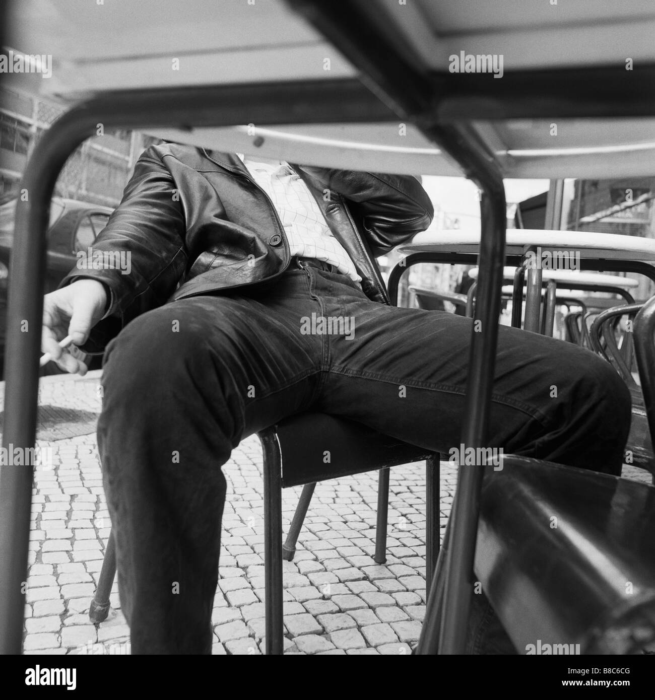 Man's Legs Under Table Stock Photo - Alamy