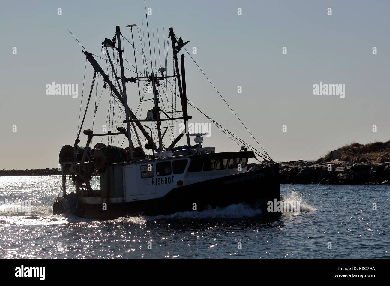 Fishing Boat returning to port at Galilee Rhode Island Stock Photo - Alamy
