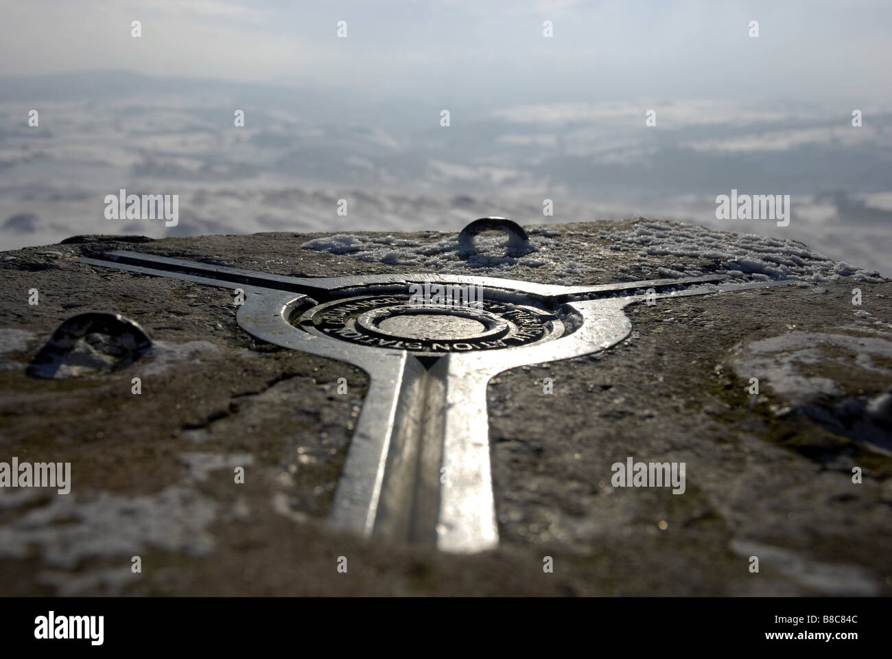 Triangulation pillar Moelfre Isaf North Wales Stock Photo - Alamy