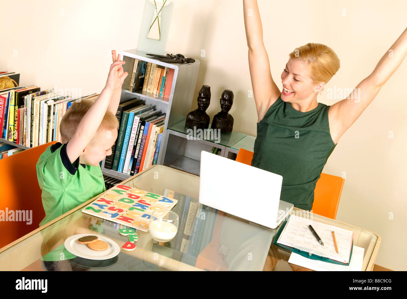 Mother Son working homework Stock Photo - Alamy