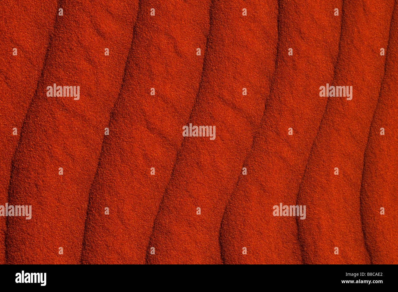 RIPPLES IN RED SAND Stock Photo - Alamy