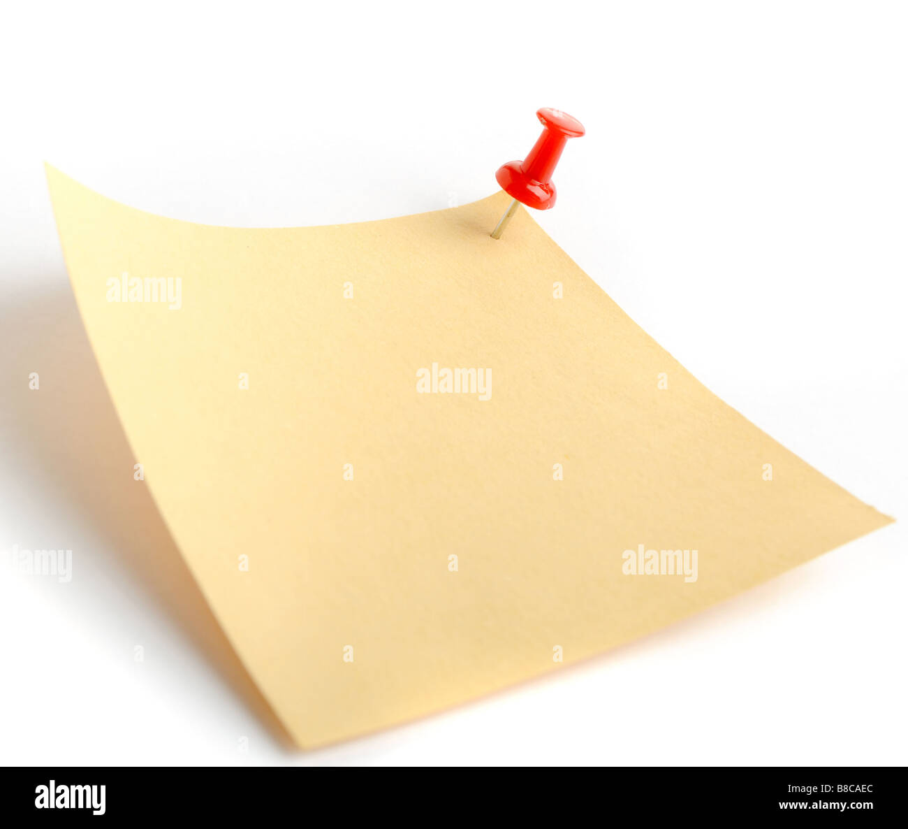 Paper note It is attached red pin on a white background Stock Photo - Alamy