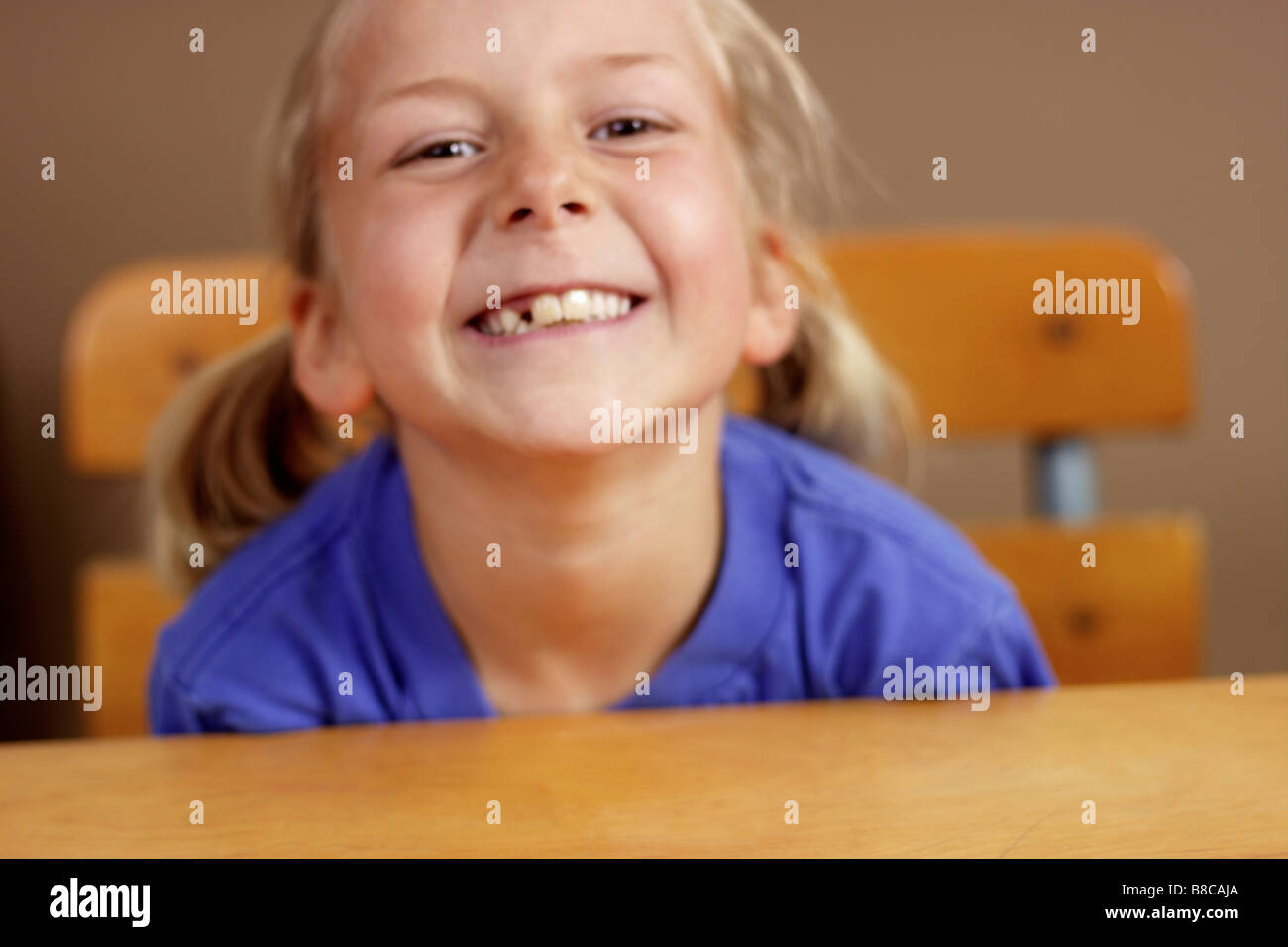 Girl Sitting Desk Stock Photo - Alamy Girl Sitting Desk Stock Photo - Alamy