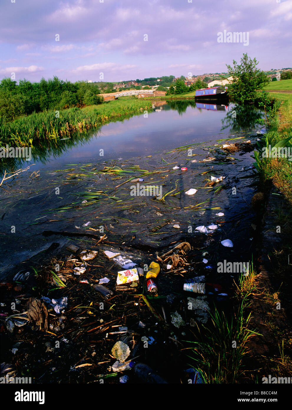 Polluted canal choked with rubbish Stock Photo - Alamy