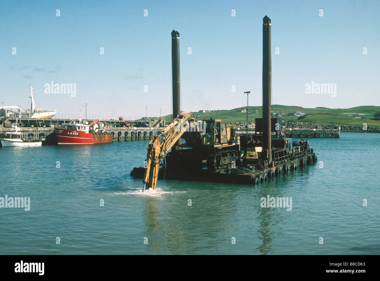 Dredger at work Stock Photo - Alamy