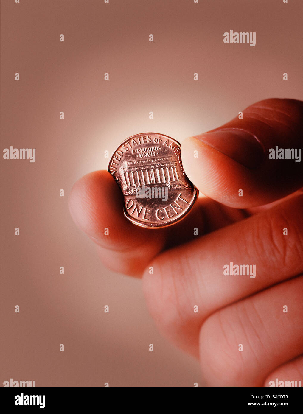 FL6243, Jim Tinios/Ted Sheppard; Fingers Pinching Penny Stock Photo - Alamy