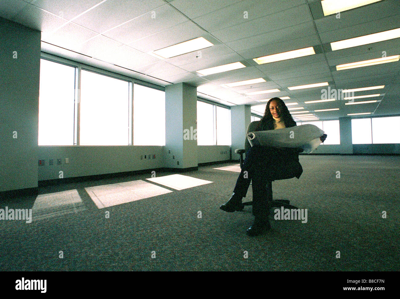 Woman blueprints empty fice hi-res stock photography and images - Alamy