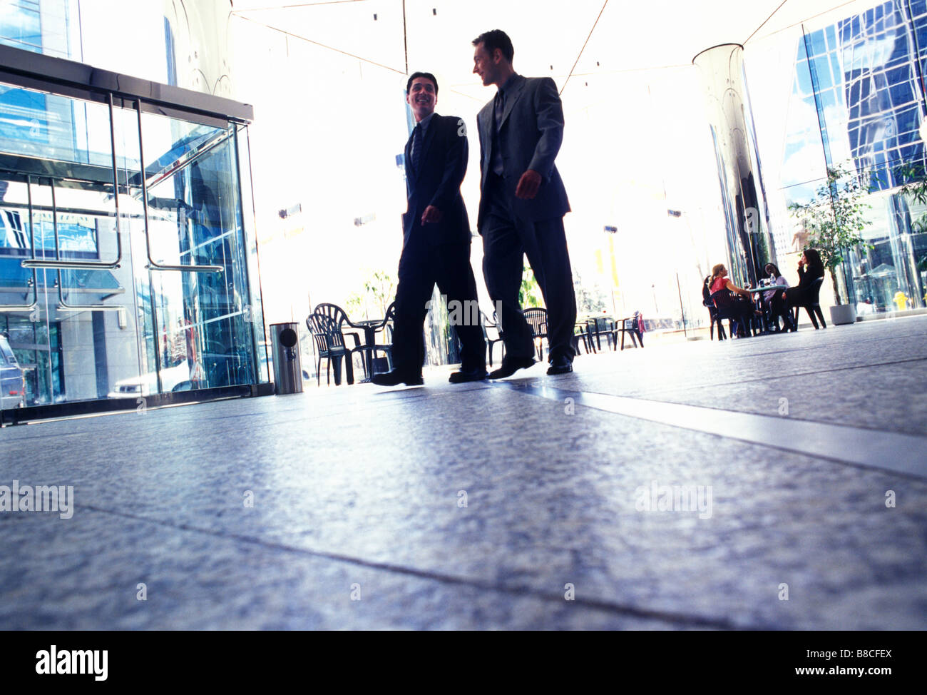 Walking through office building lobby hi-res stock photography and ...