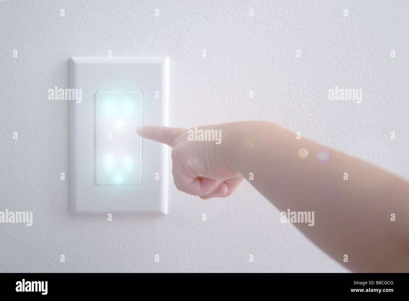 Child's Finger Pointing Electrical Outlet Stock Photo - Alamy