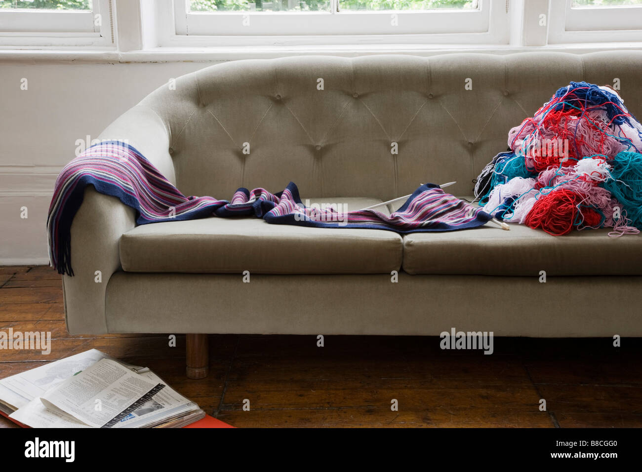 Wool threads on sofa Stock Photo - Alamy