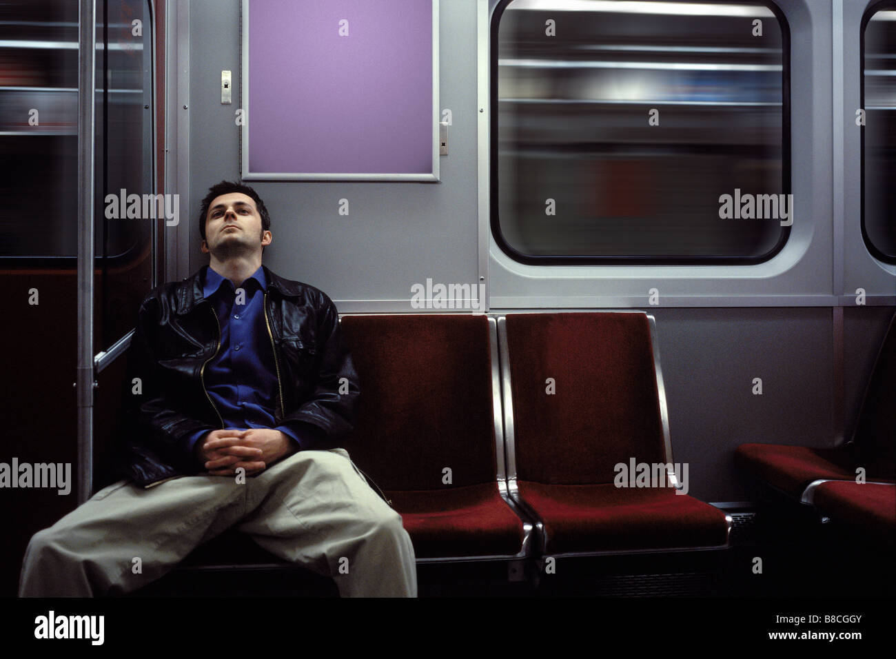 Tired man sitting subway hi-res stock photography and images - Alamy