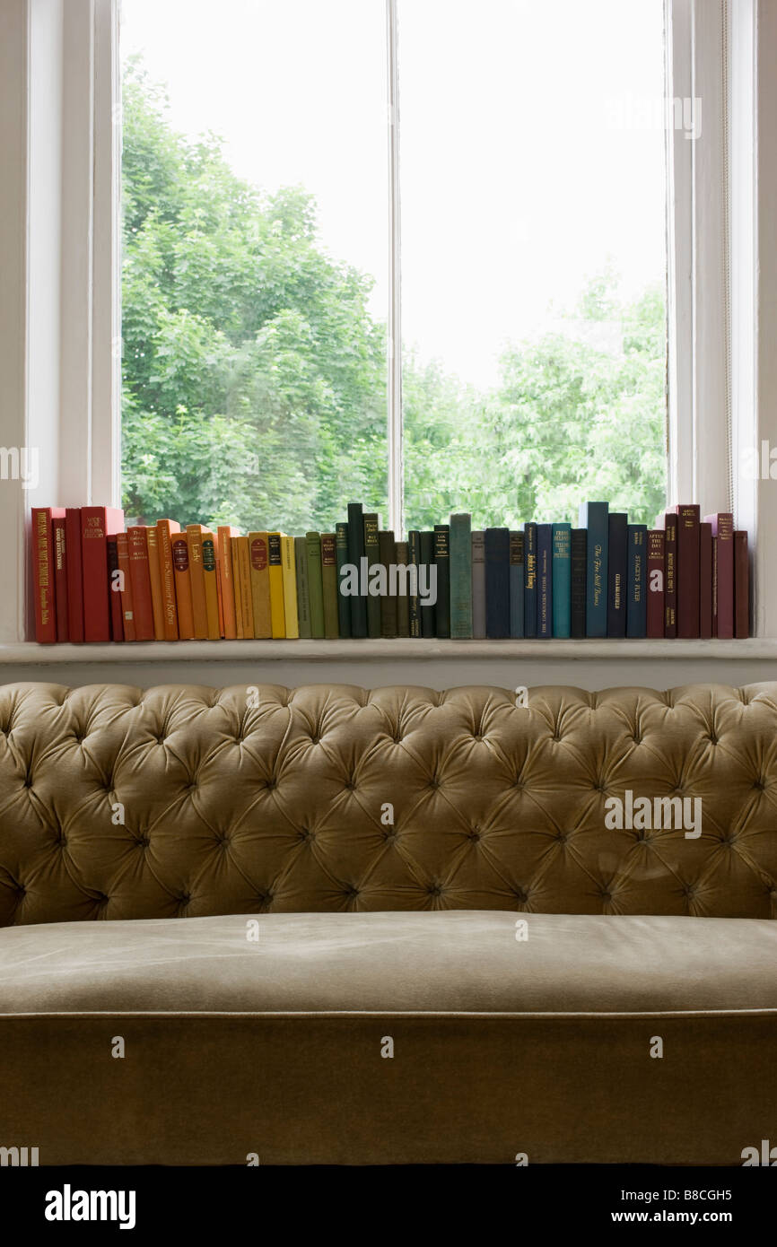 Row books on windowsill hi-res stock photography and images - Alamy