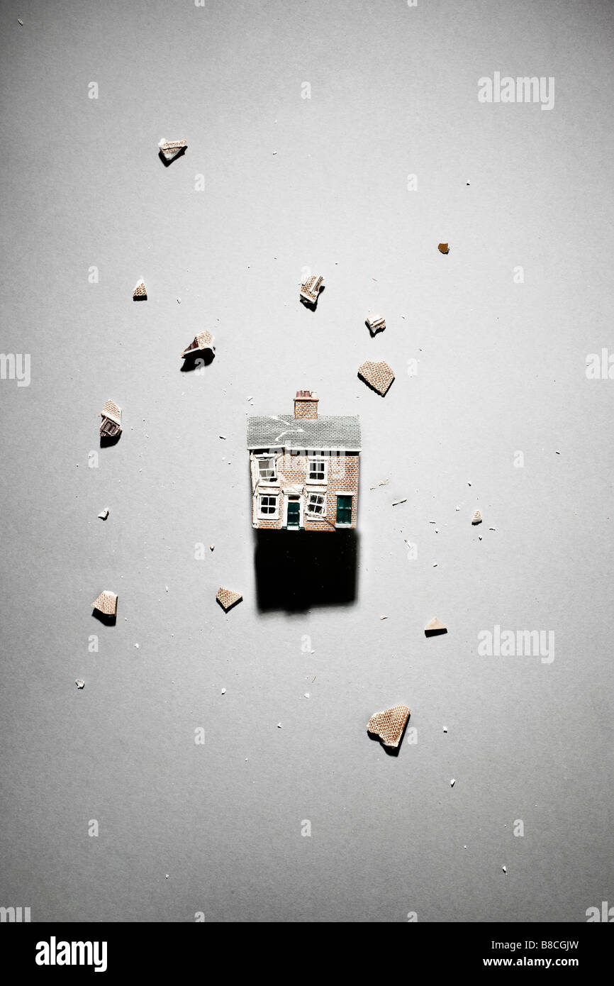 Smashed model house Stock Photo - Alamy