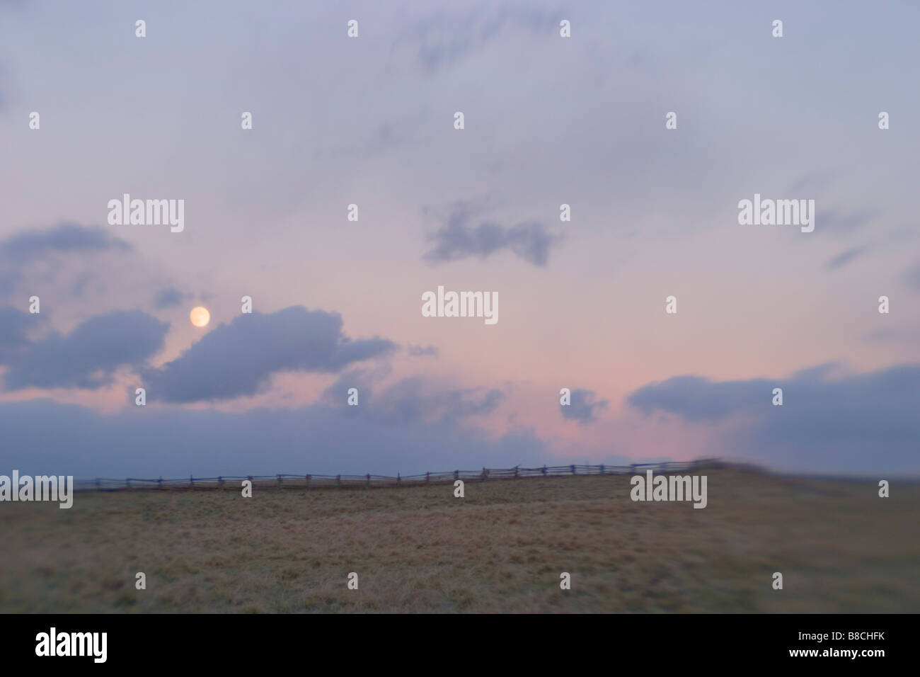 Moon behind clouds hi-res stock photography and images - Alamy
