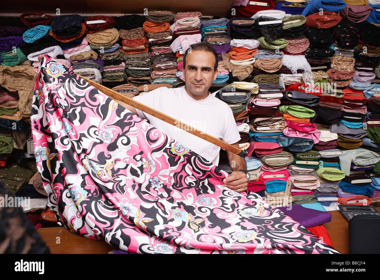 Fabric Store Worker Stock Photo - Alamy