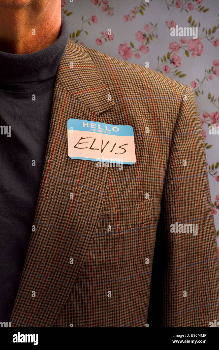 Man wearin Elvis Name Tag Stock Photo - Alamy