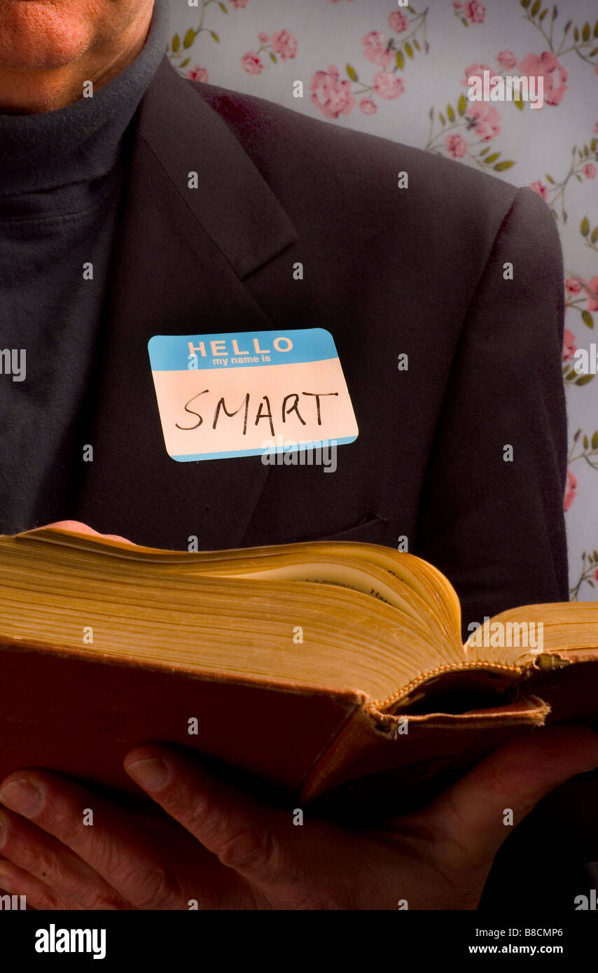 Man Smart Name Tag Reading Book Stock Photo - Alamy