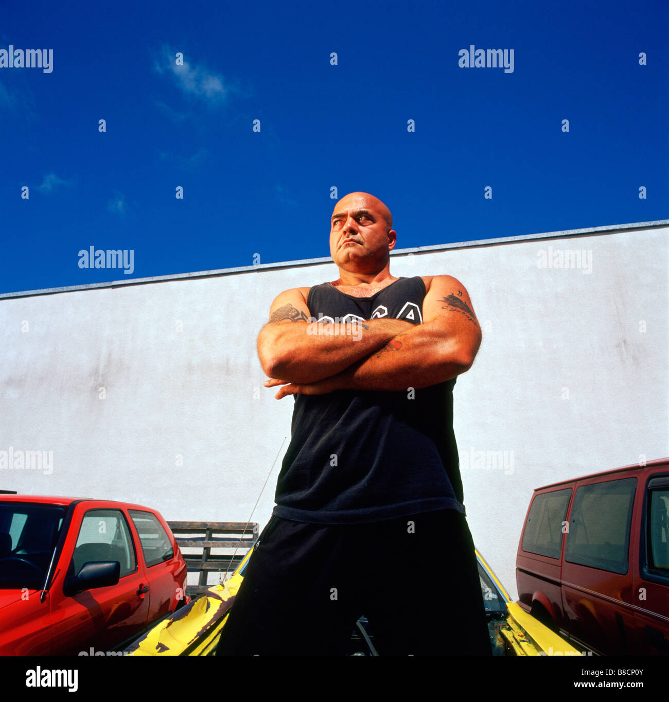 Man Standing Arms Crossed Wrecked Car Stock Photo - Alamy