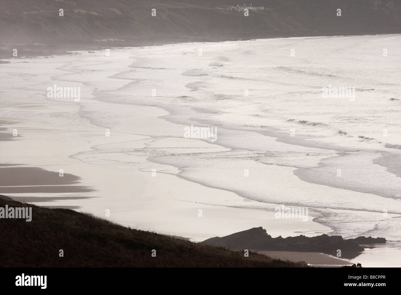 Waves lapping on the beach hi-res stock photography and images - Alamy