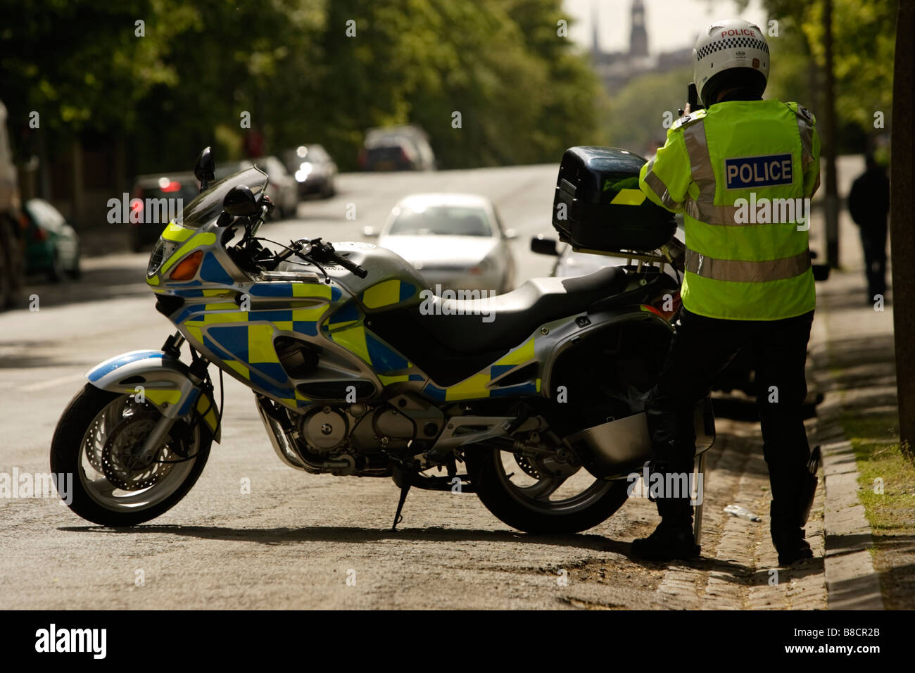 A policeman and his motorbike Stock Photo - Alamy