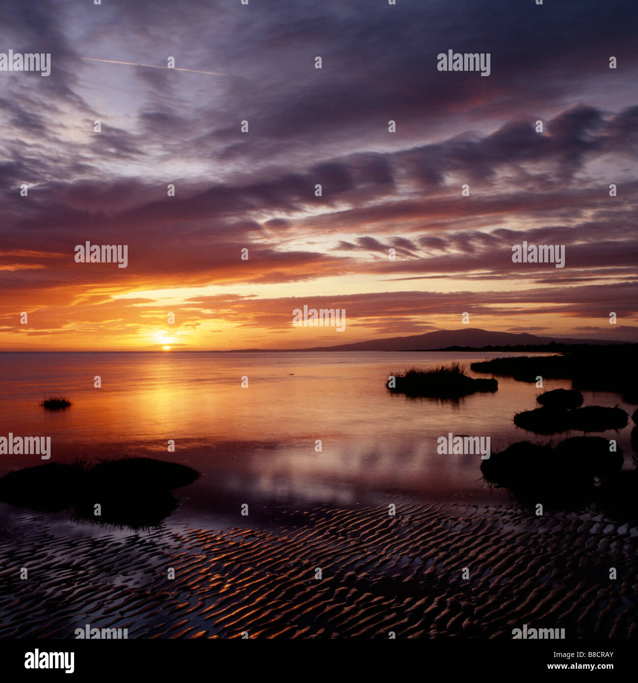 A scenic atmospheric landscape sunset on the Solway Firth estuary ...