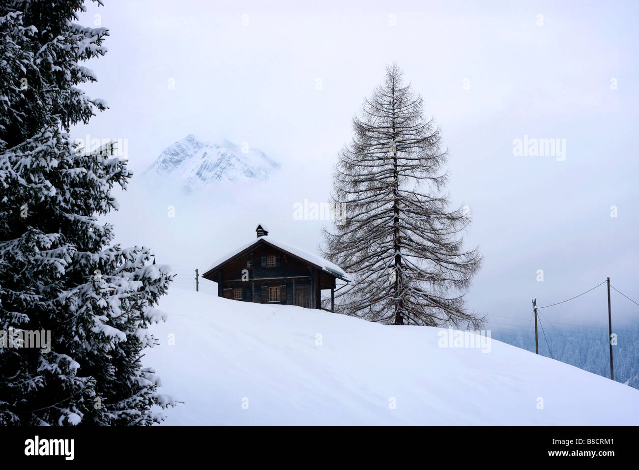 View of a chalet and the Fitzer mountain in Adelboden, Switzerland ...