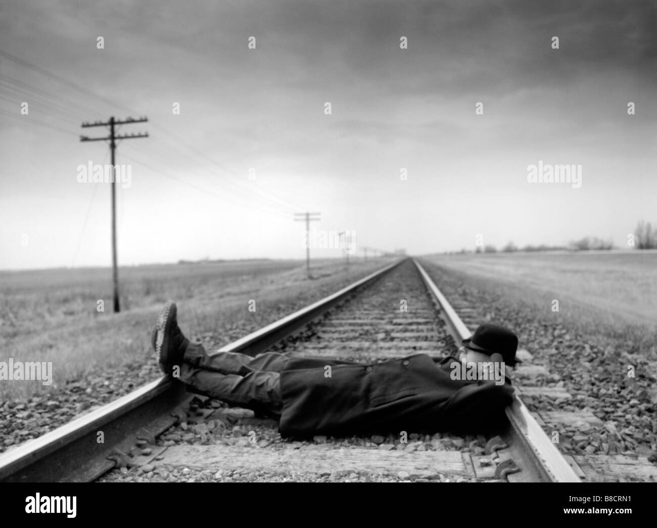 Man Lying Train Tracks Stock Photo - Alamy
