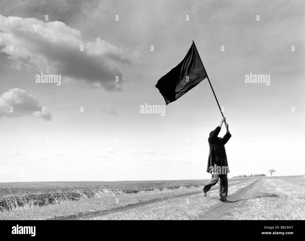 Man Waving Flag Field Stock Photo - Alamy