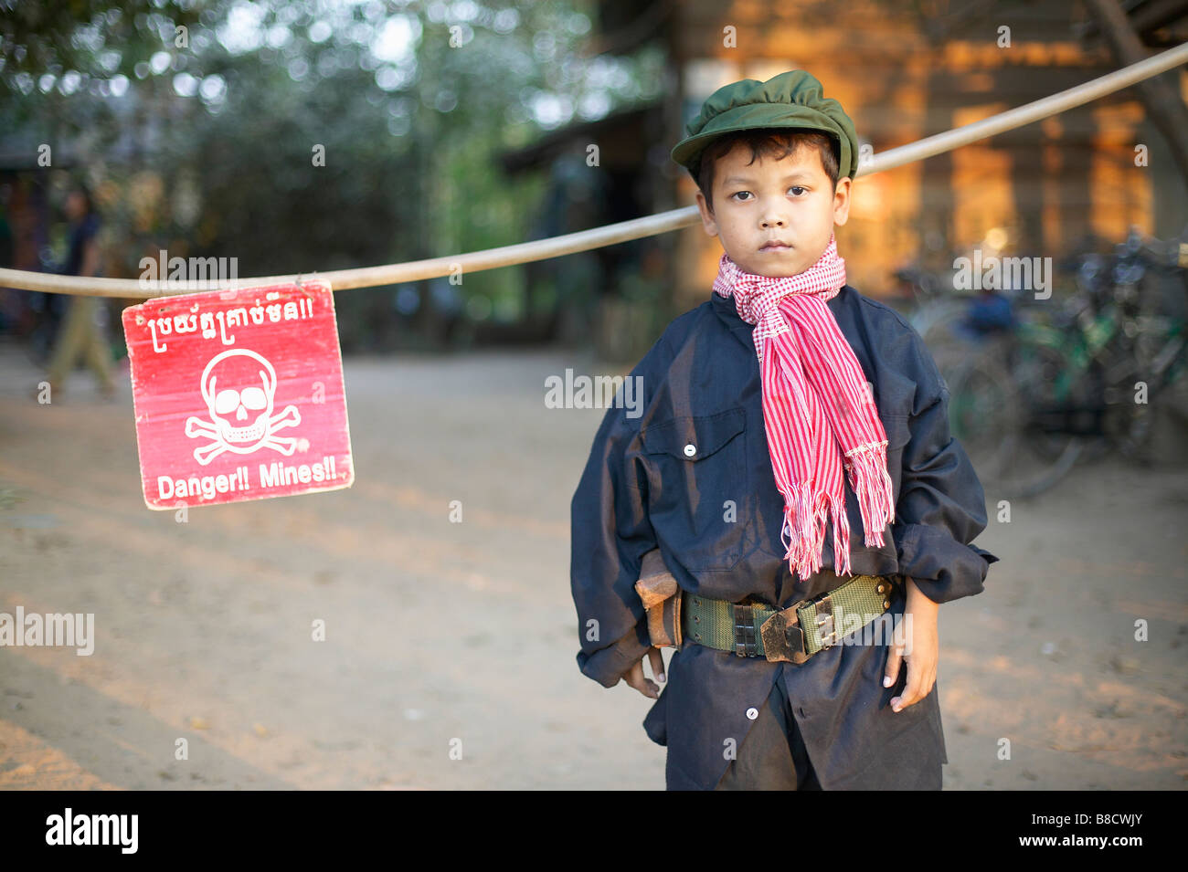 Young Boy Dressed as Guard, Landmine Museum, Cambodia Stock Photo - Alamy