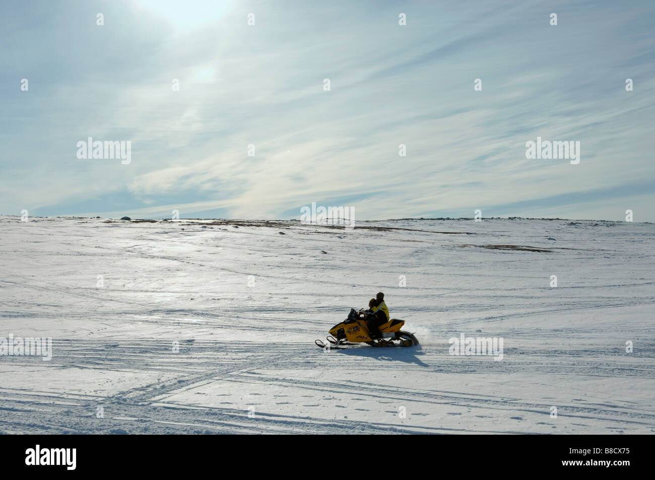 Snowmobiling, outside Cambridge Bay, Nunavut Stock Photo - Alamy