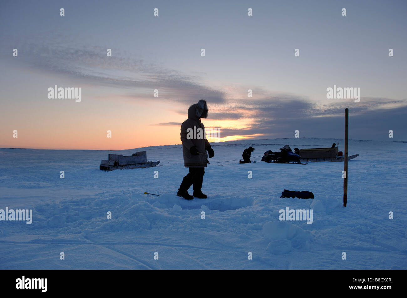 Ice Fishing, Near Mount Pelly, Nunavut Stock Photo - Alamy