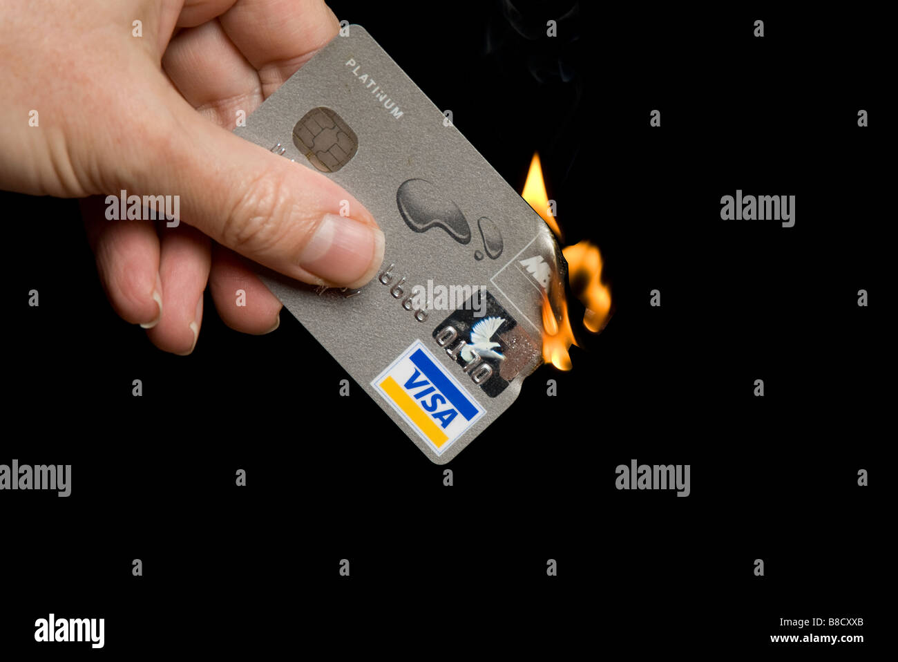 burning credit card Stock Photo - Alamy