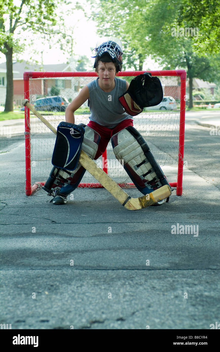 Young Boy Playing Street Hockey Stock Photo - Alamy Young Boy Playing Street Hockey Stock Photo - Alamy