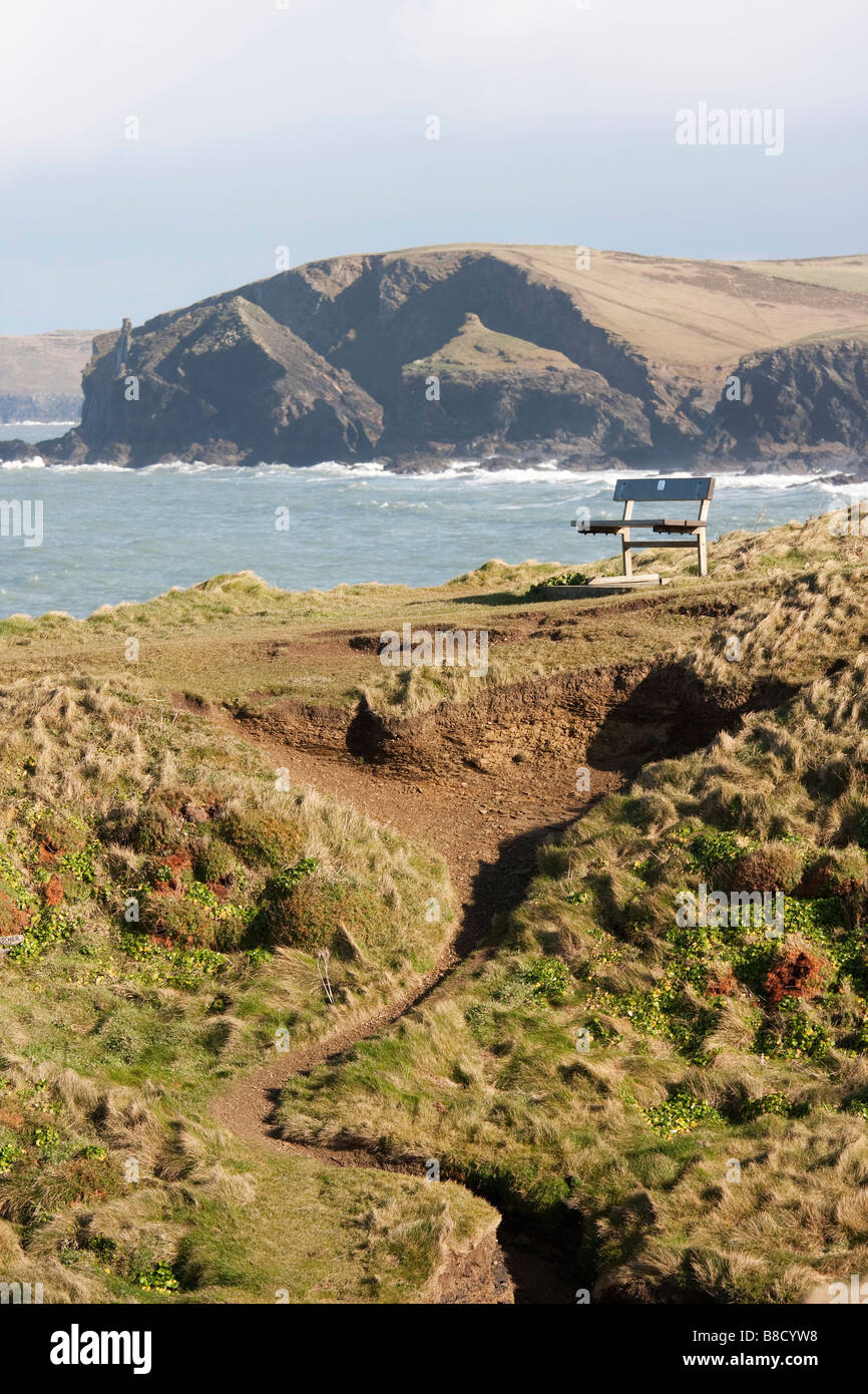 bench seat on a cliff top with view of ocean Stock Photo - Alamy