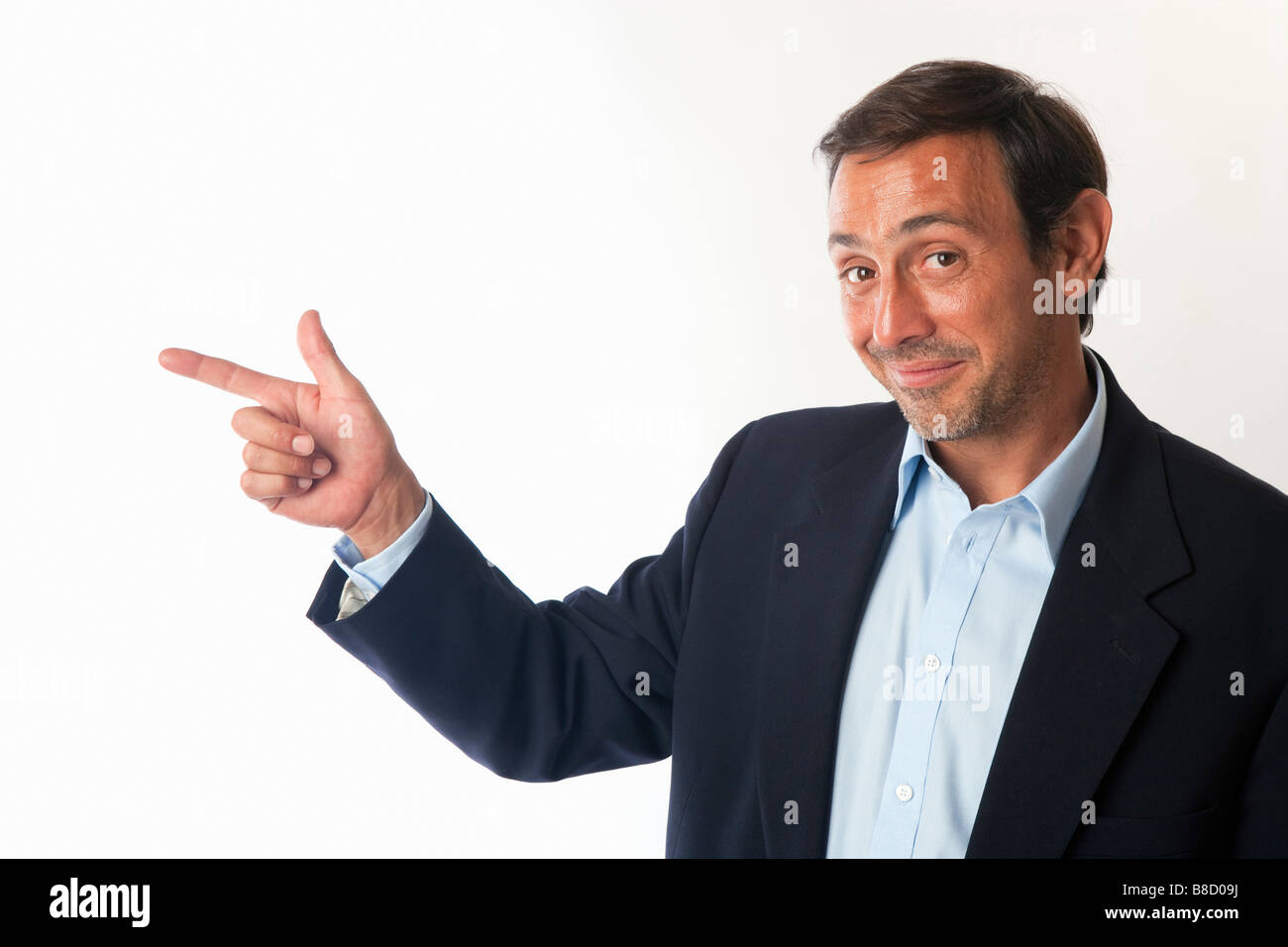 Man on white background pointing to the side Stock Photo - Alamy