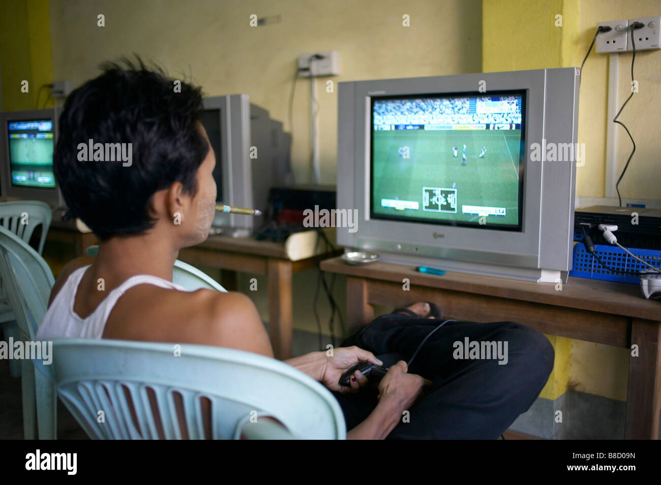 Boy Playing Video Game, Mandalay, Myanmar (Burma Stock Photo - Alamy