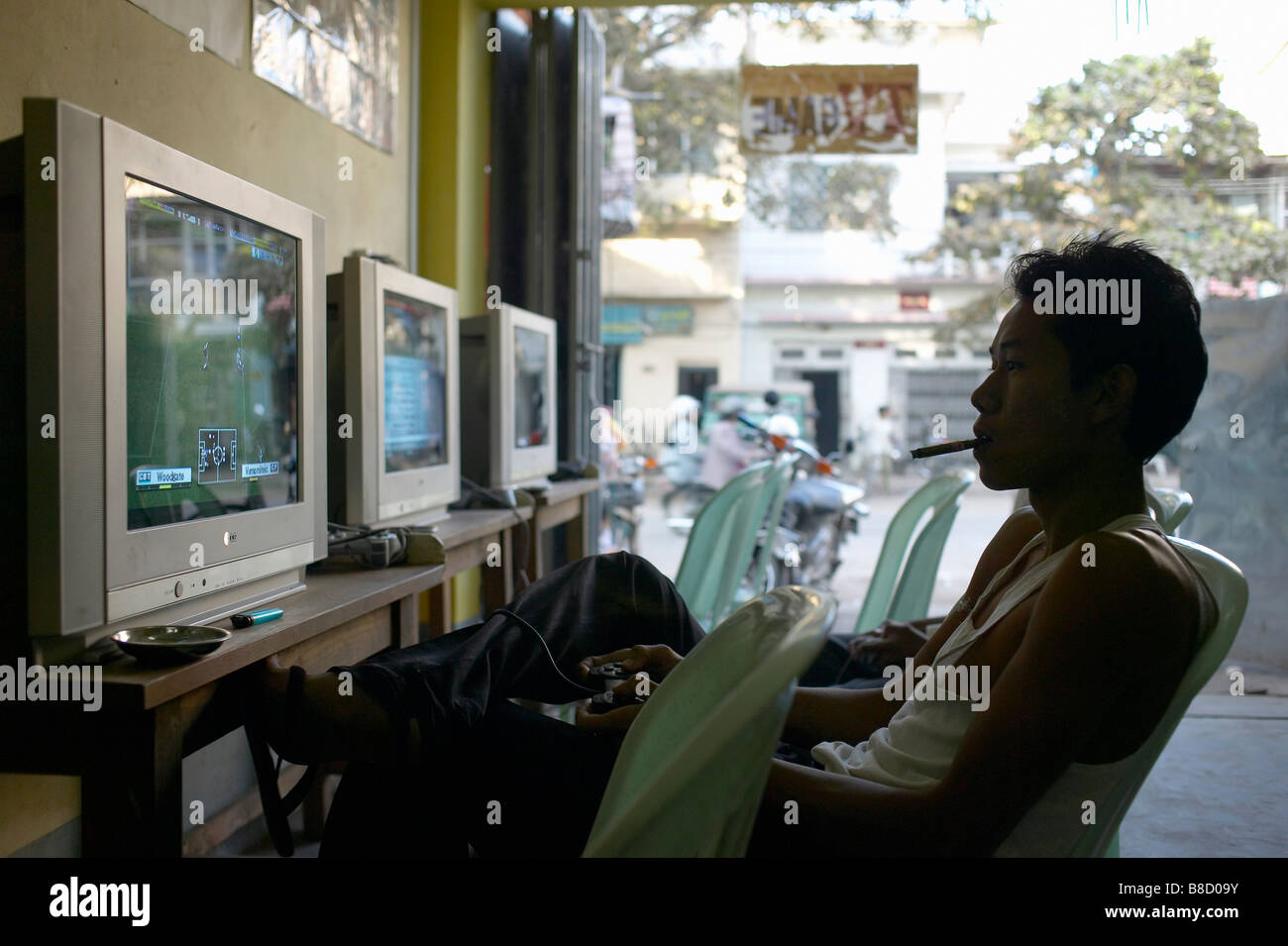Boy Playing Video Game, Mandalay, Myanmar (Burma Stock Photo - Alamy