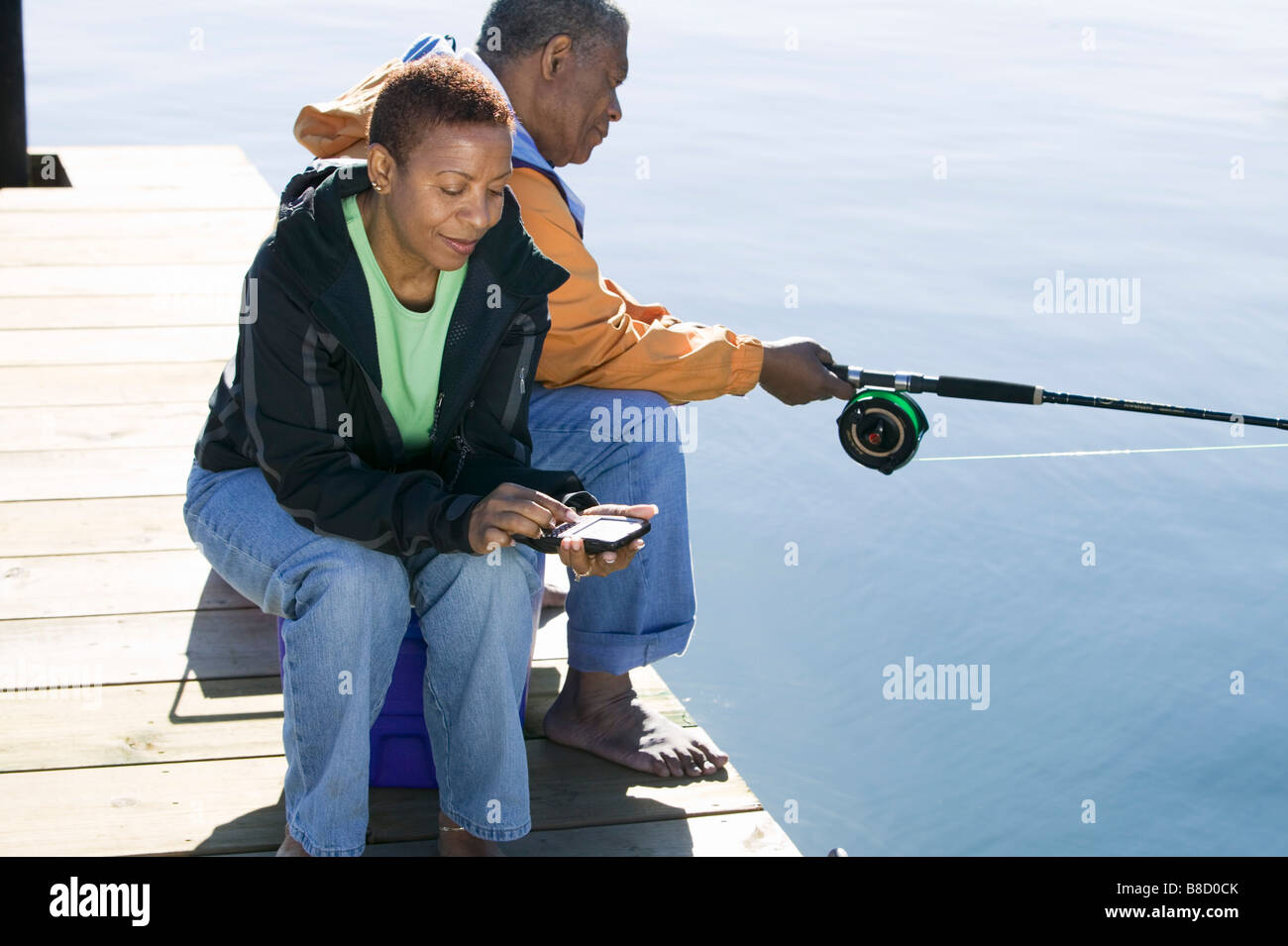 African american woman fishing hi-res stock photography and images - Alamy