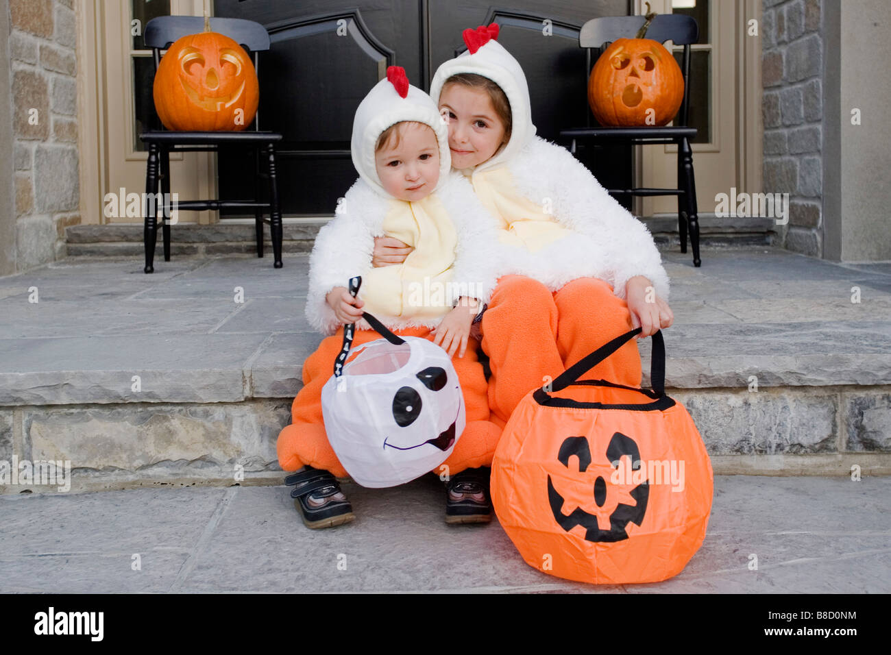 Brother Sister getting ready to go Trick-or-Treating Stock Photo - Alamy