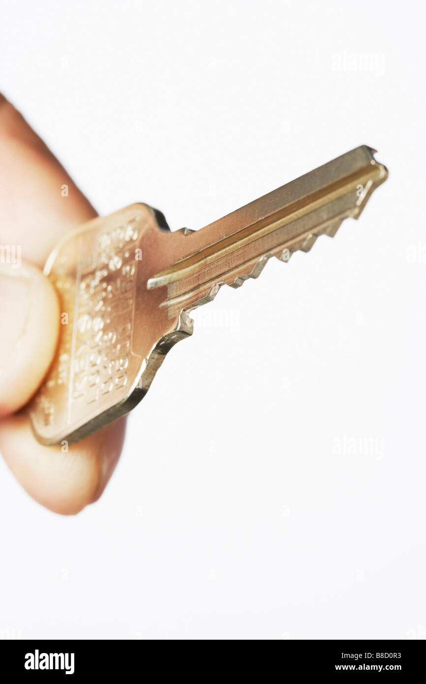 Hand Holding Key Stock Photo - Alamy