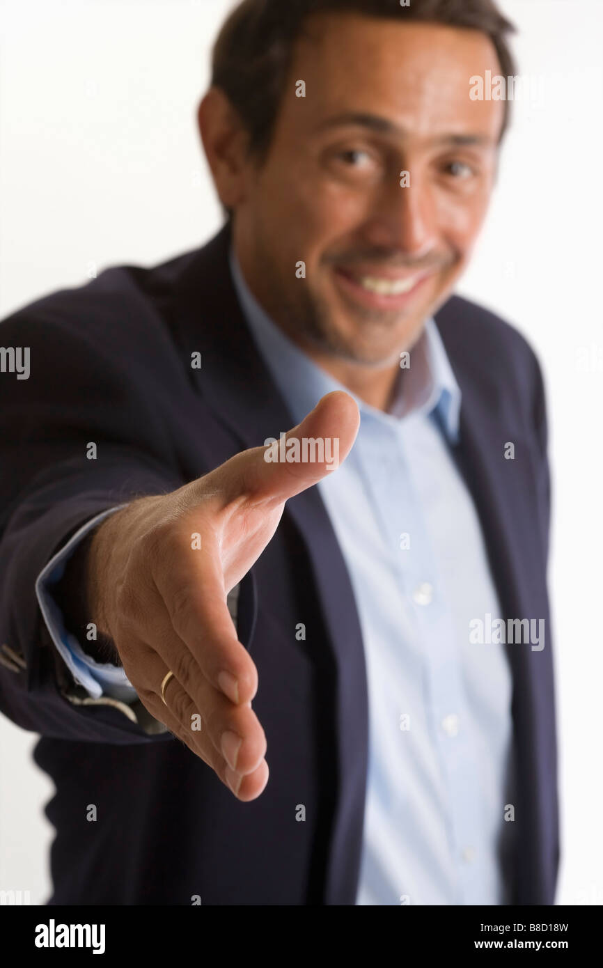 Extending hand of friendship hi-res stock photography and images - Alamy